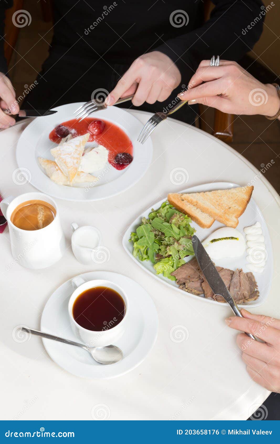 People Eating Breakfast in a Cafe Stock Photo - Image of meal ...