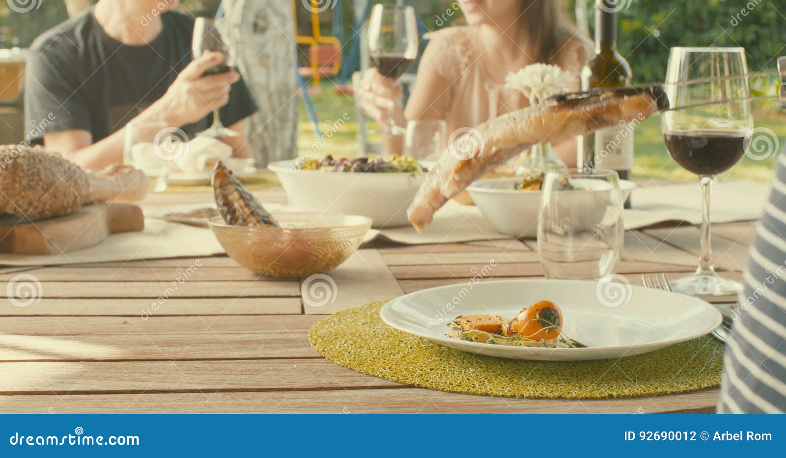 People Eating Launch and Drinking Wine on a Porch Table Stock Footage ...