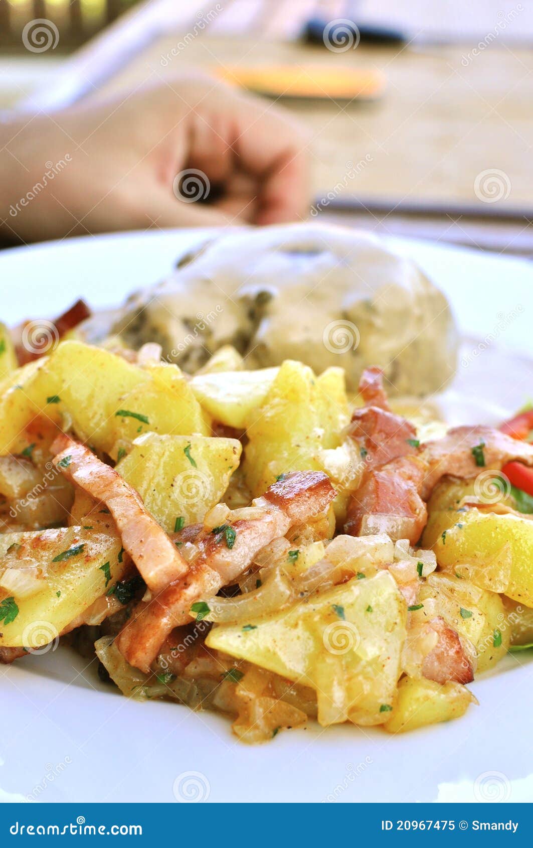 People Eating Traditional Patatoes Baked with Ham Stock Image - Image ...