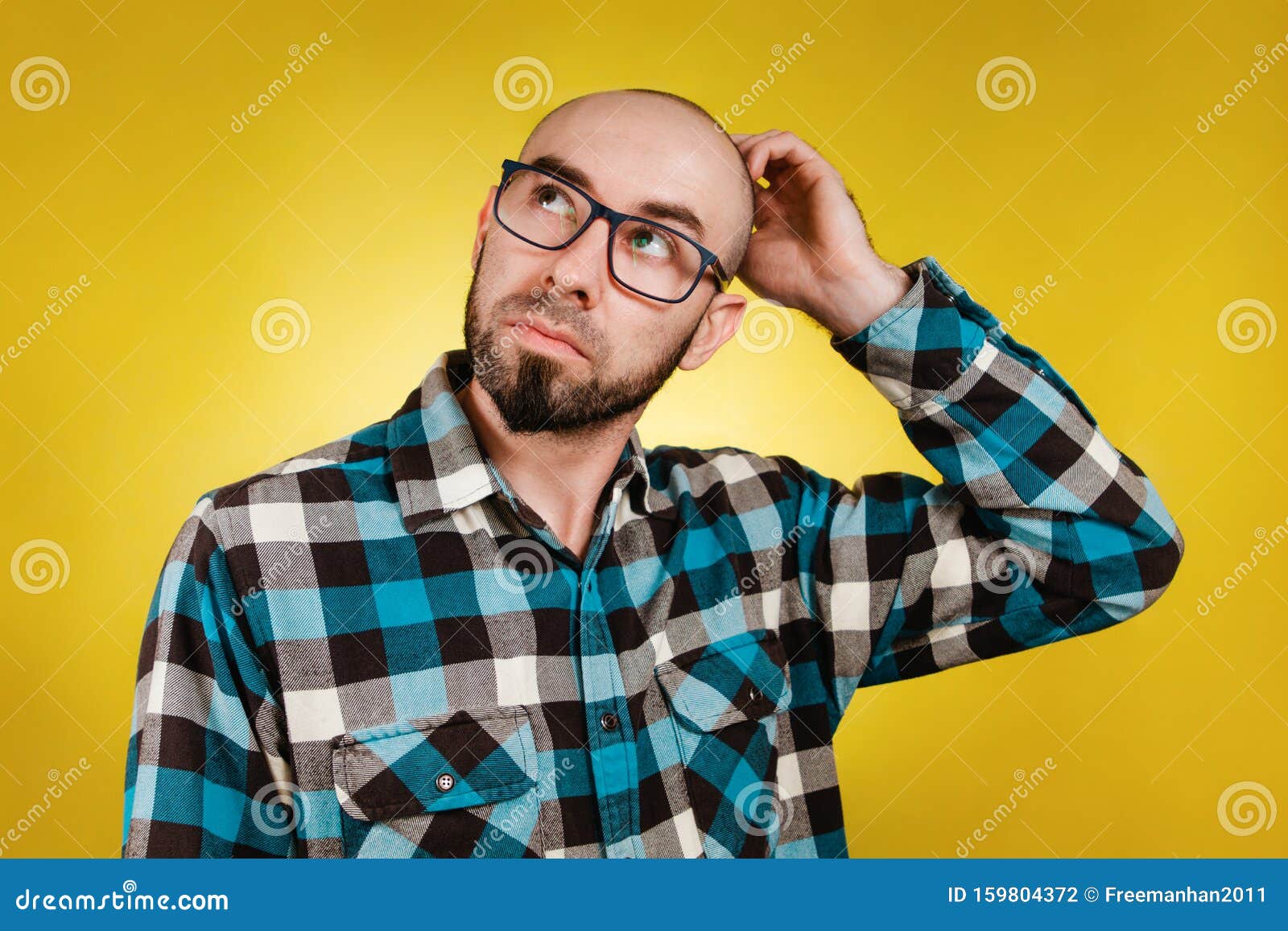 People And Emotions A Bald Bearded Man In Glasses And A Blue Plaid