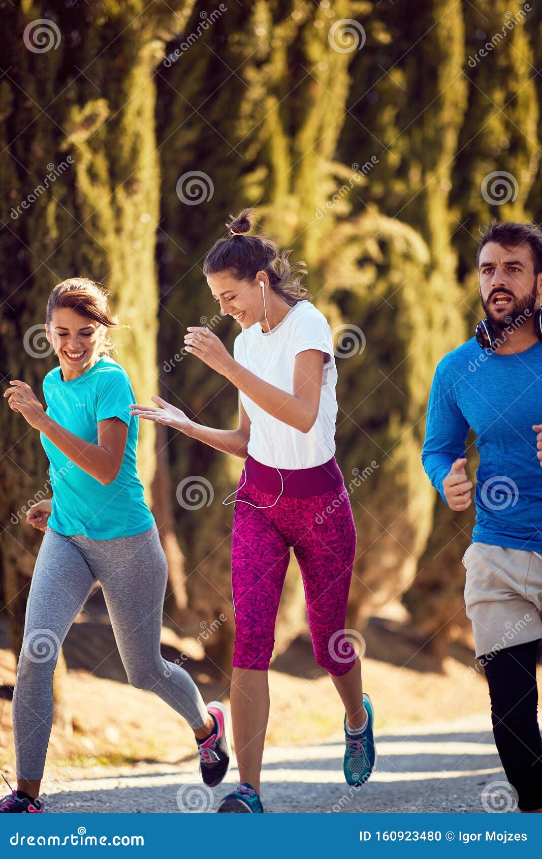People Enjoying at Running Together Outdoors Stock Photo - Image of ...