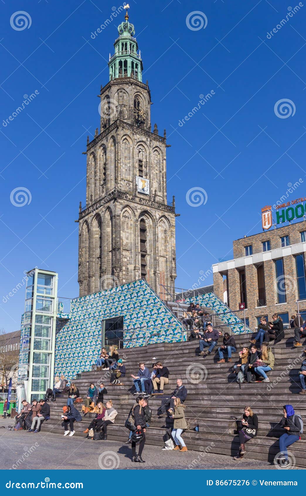People Enjoying the Spring Sun in Front of the Martini Tower Editorial ...