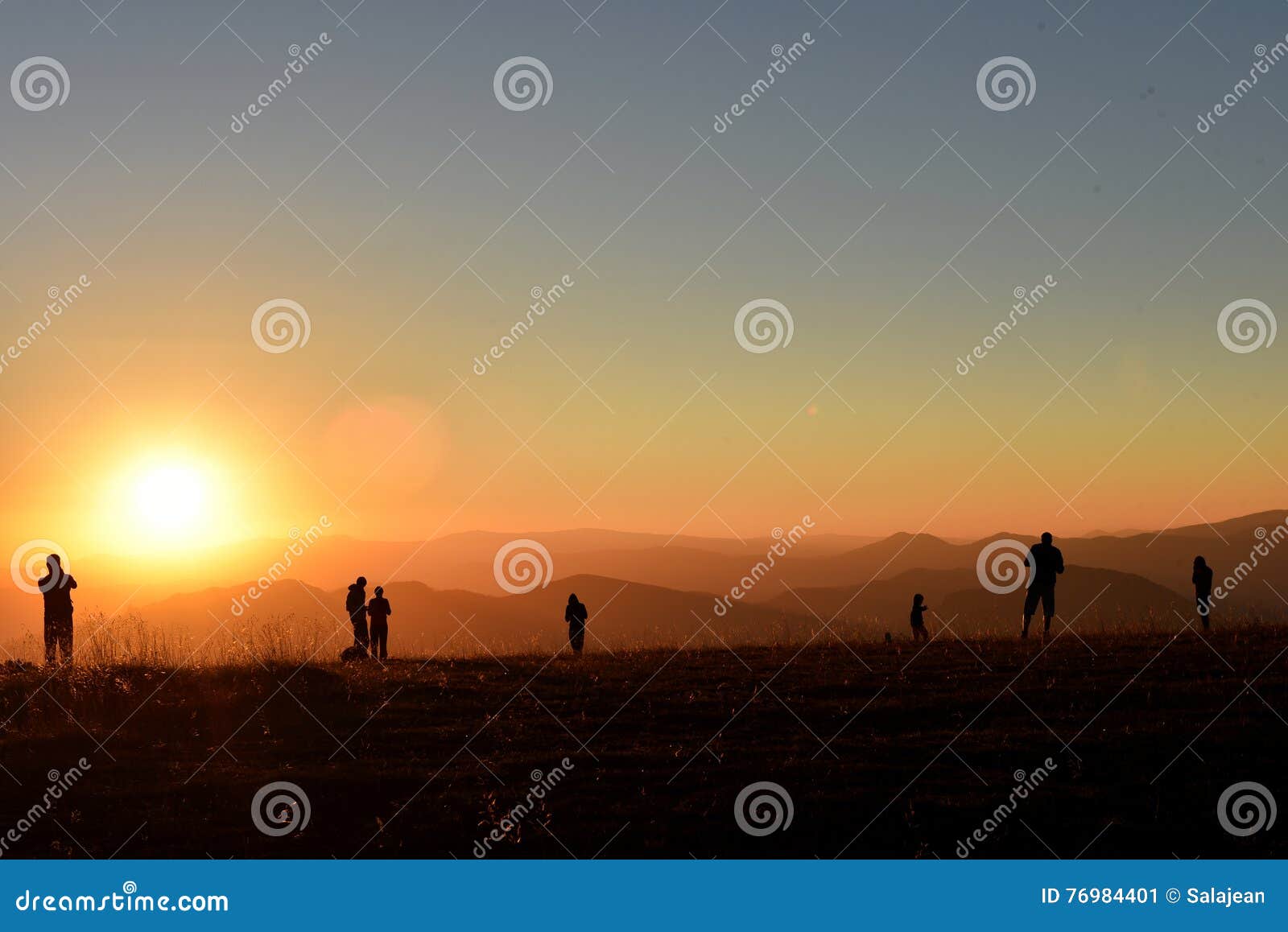 People Enjoying Sunset in the Mountains Stock Image - Image of group ...