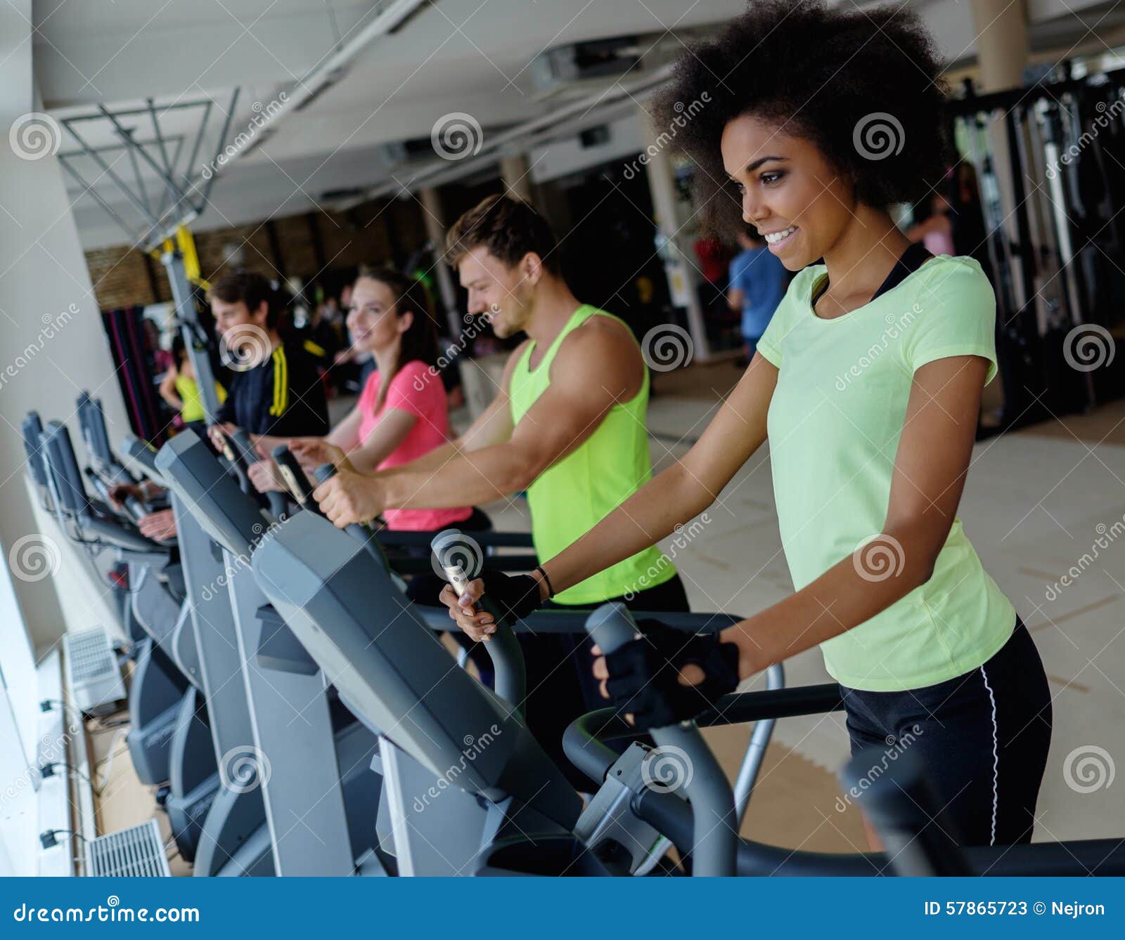 People Exercising on a Cardio Training Machines Stock Image - Image of ...