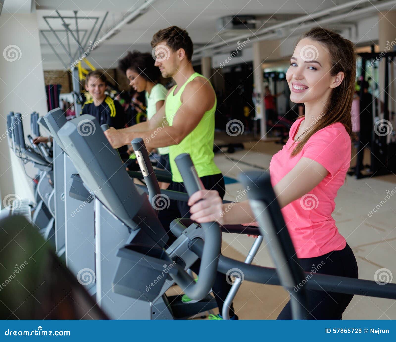 People Exercising on a Cardio Training Machines Stock Photo - Image of ...