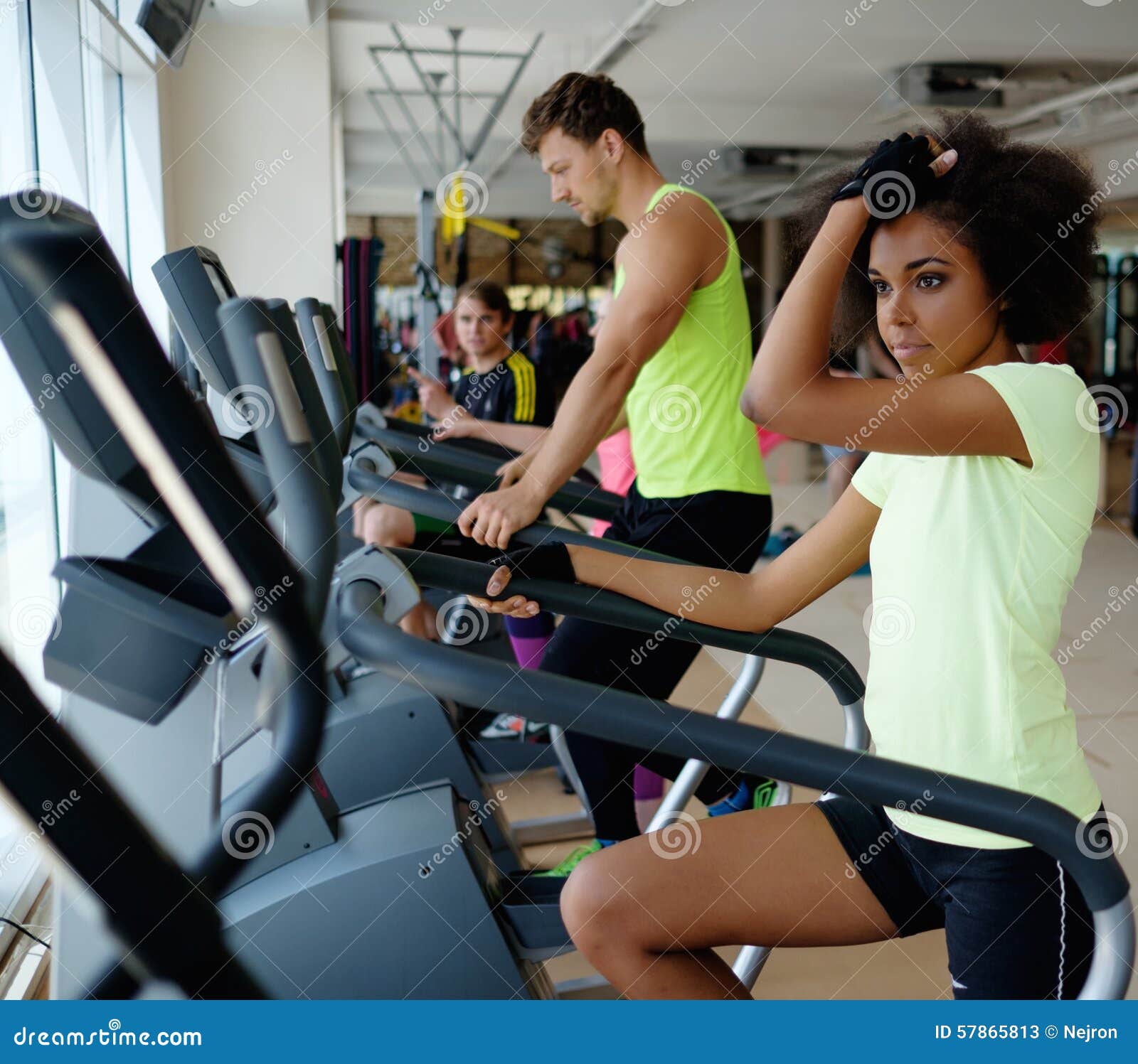 People Exercising on a Cardio Training Machines Stock Image - Image of ...