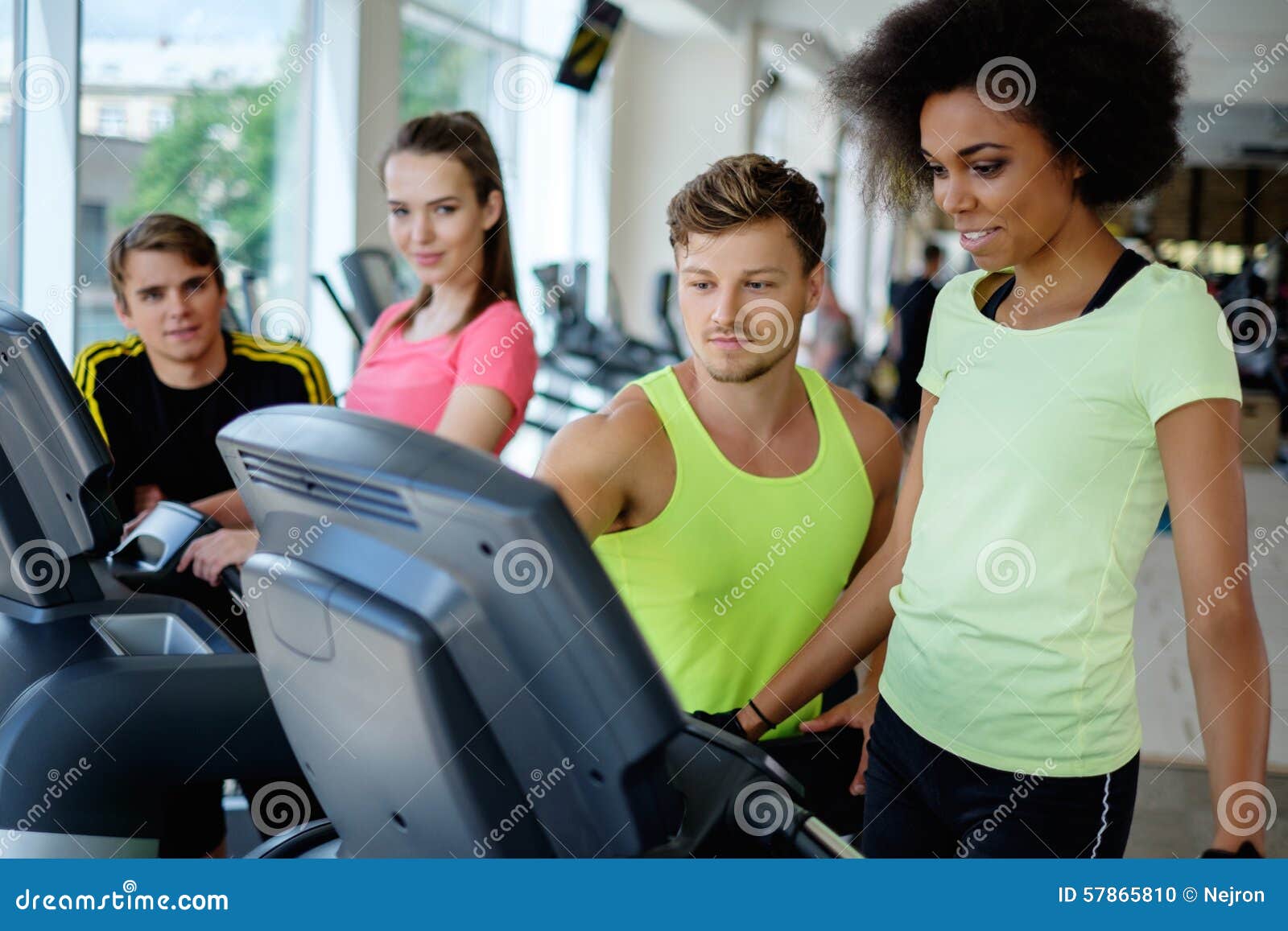 People Exercising on a Cardio Training Machines Stock Photo - Image of ...