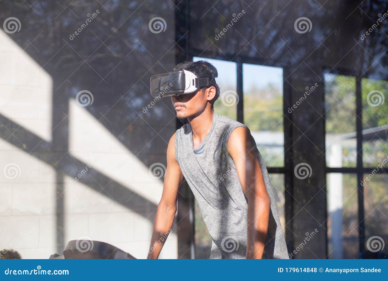People Exercising on a Treadmill Use it with a VR Goggles Headset Stock ...