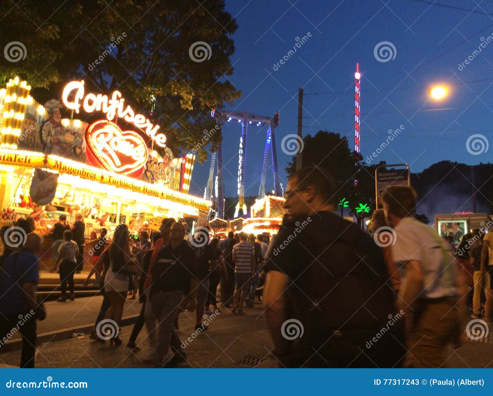 People at a Fair in the Evening Editorial Stock Photo - Image of stands ...