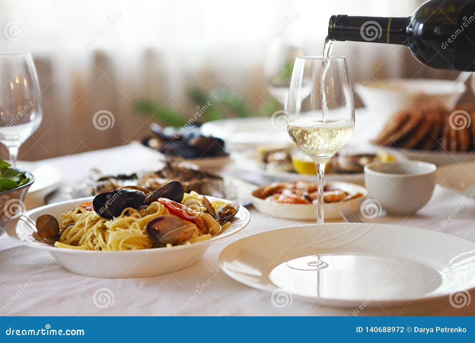 People Fine Dining Seafood and White Wine on the Table Stock Photo ...