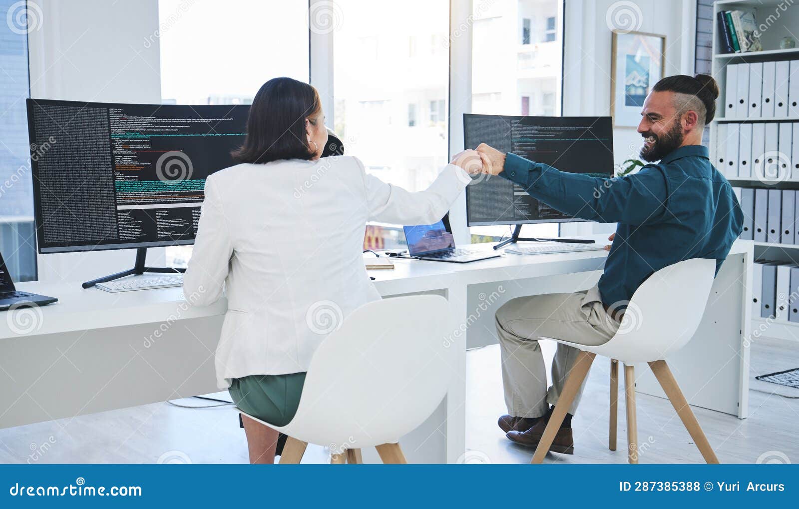 People, Fist Bump and Coding, Computer Screen and Software Development or Programming Success in ...