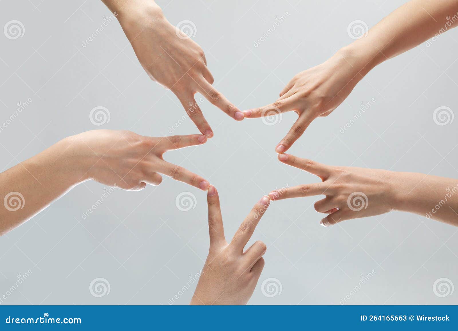 People Forming a Star Shape with Their Fingers. Concept of Teamwork ...