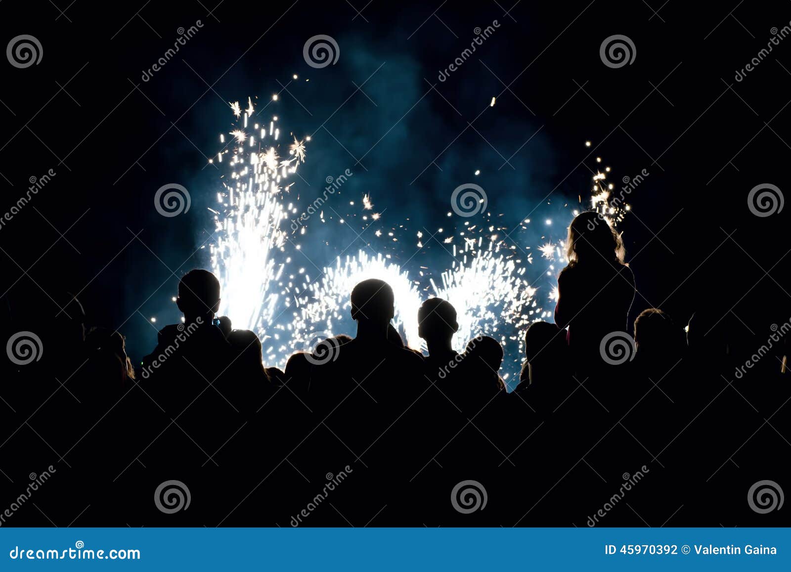 People in Front of a Fireworks Stock Photo - Image of dark, burning ...