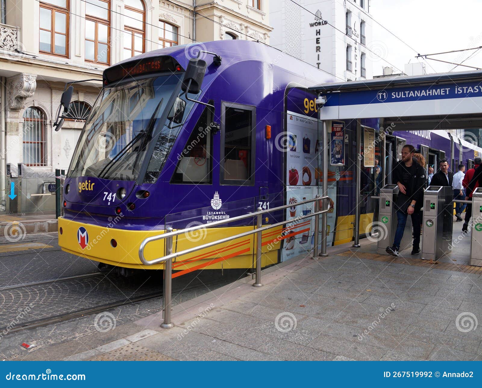 A Surface Metro Station With A Red Departing Train And A Two-level Car ...
