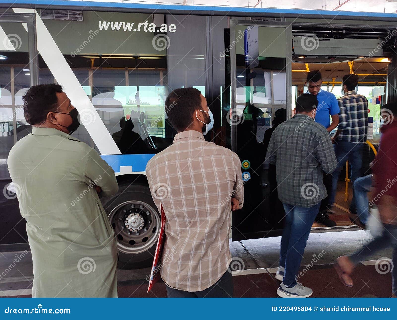 People Getting into a Bus in Dubai Editorial Stock Image - Image of ...