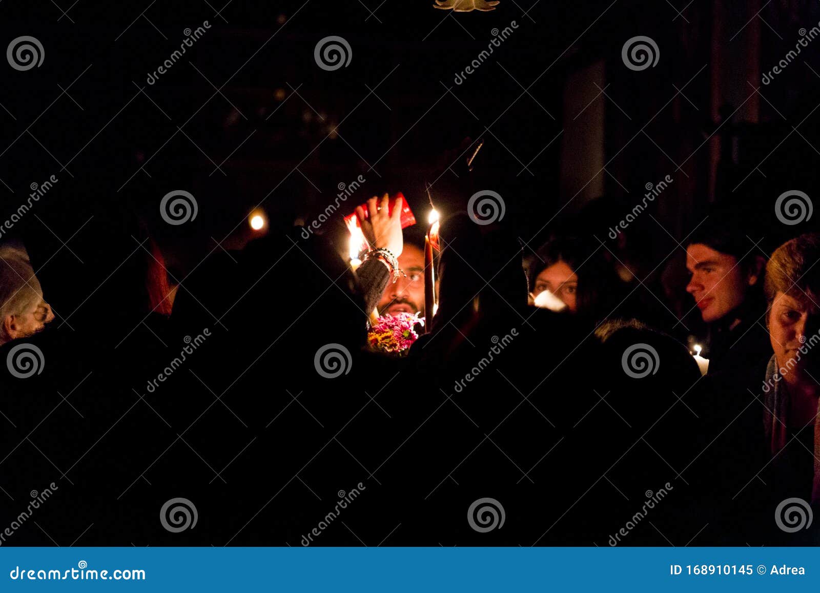 People Getting Light from the Priest in Easter Mass Stock Image - Image ...