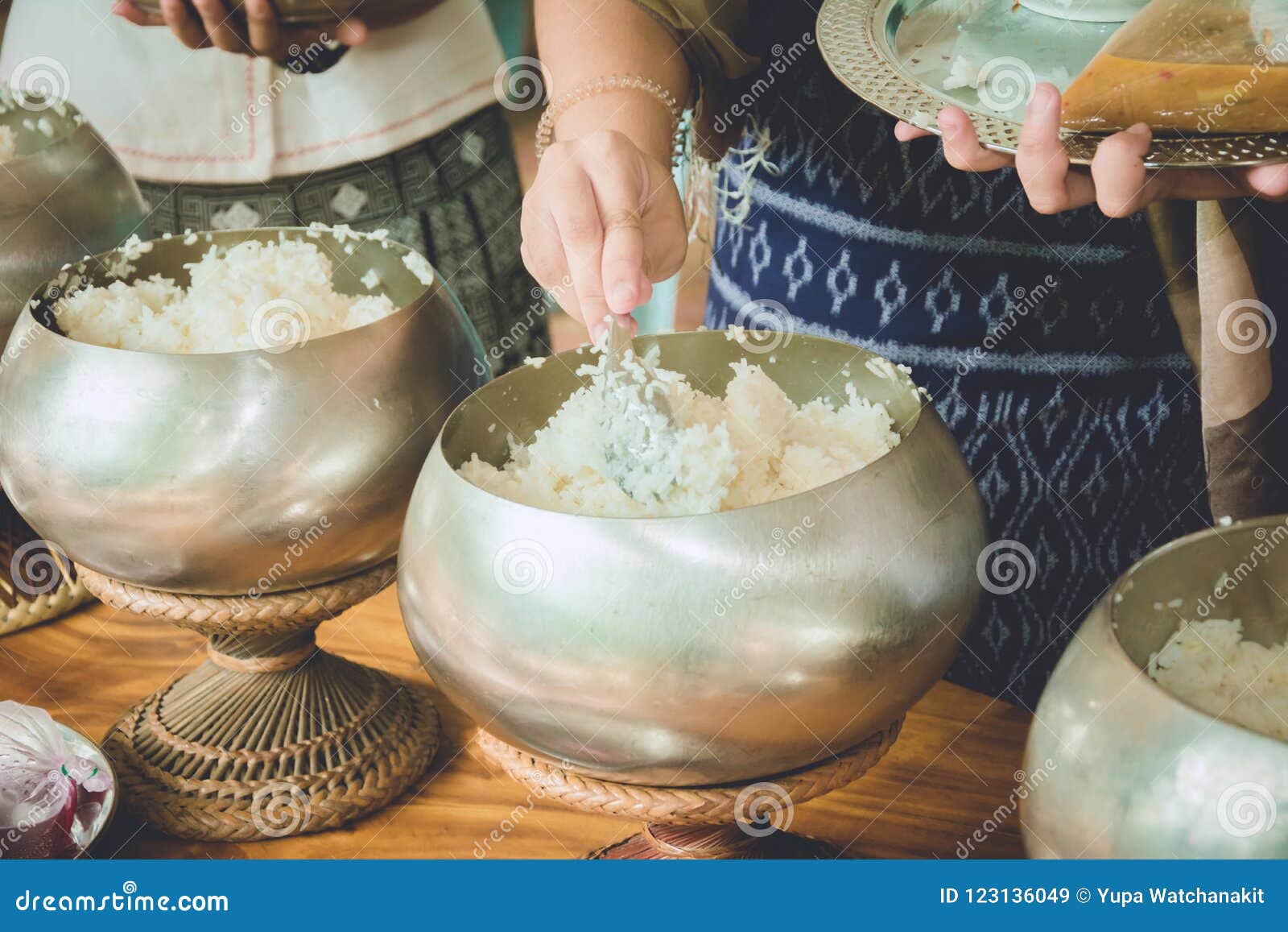 People Give Rice In Alms Bowl Of Buddhist Monk, Food Offering For A ... People Give Rice In Alms Bowl Of Buddhist Monk, Food Offering For A ...