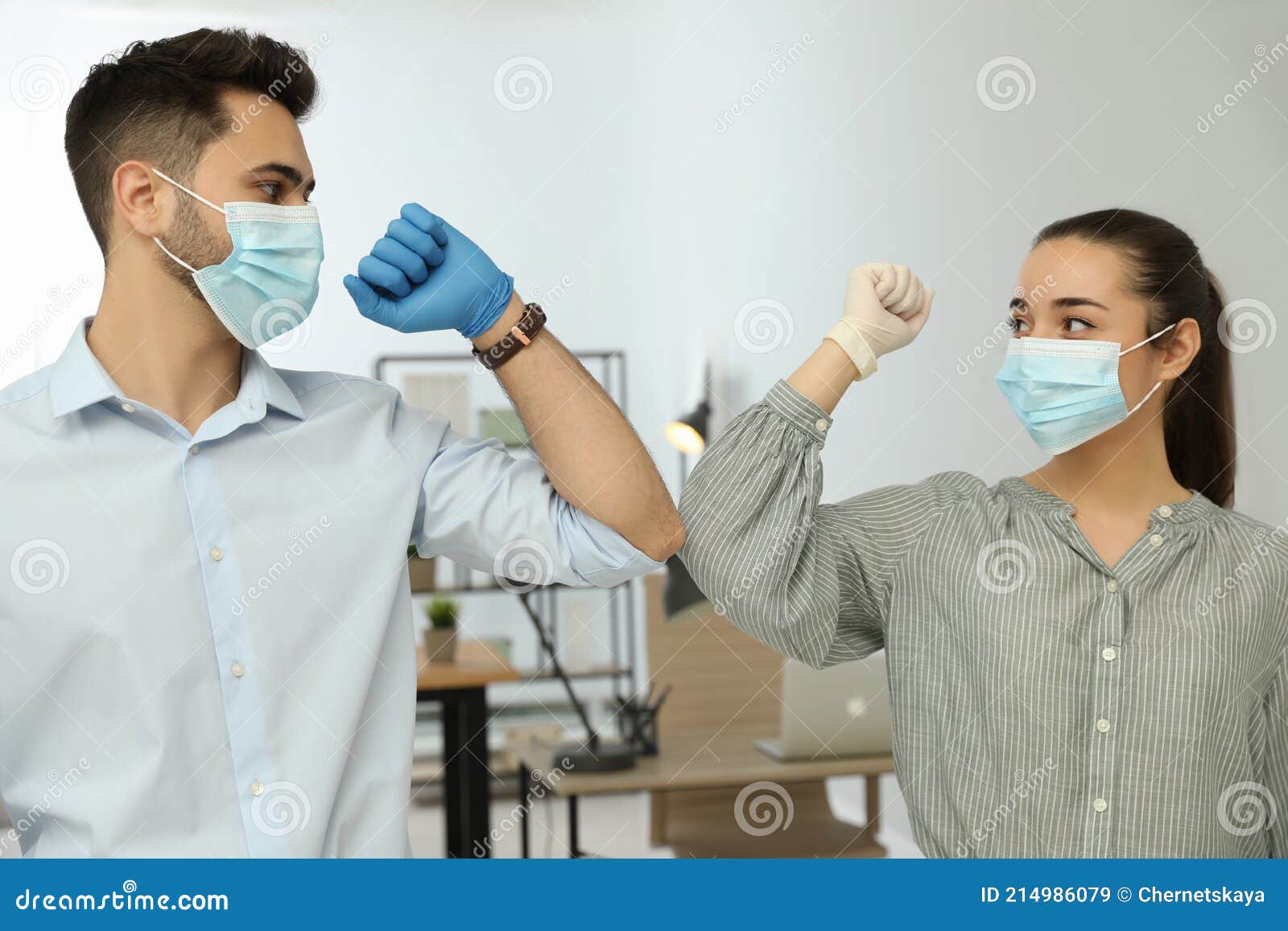 People Greeting Each Other by Bumping Elbows instead of Handshake in ...