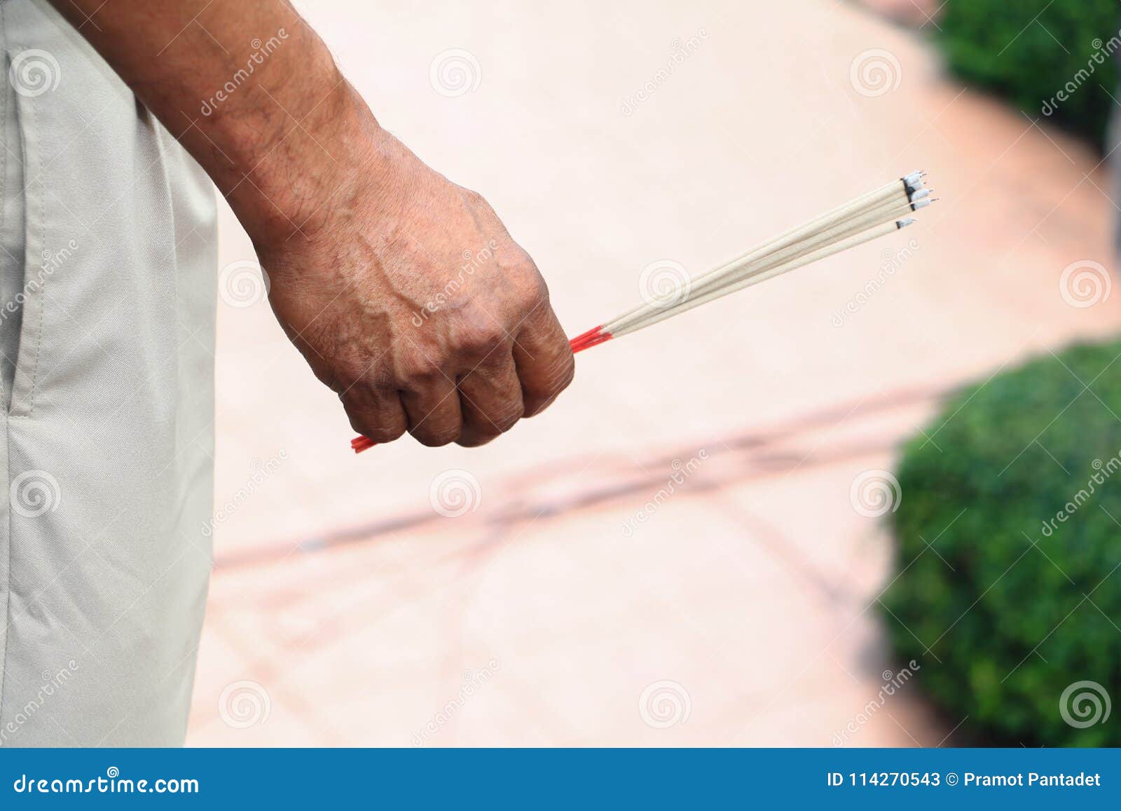 People Hand Holding Incense Stick in a Temple Stock Image - Image of ...