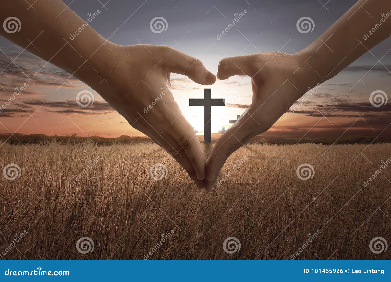 People Hand Making Heart Sign with Bright Cross Inside Stock Photo ...