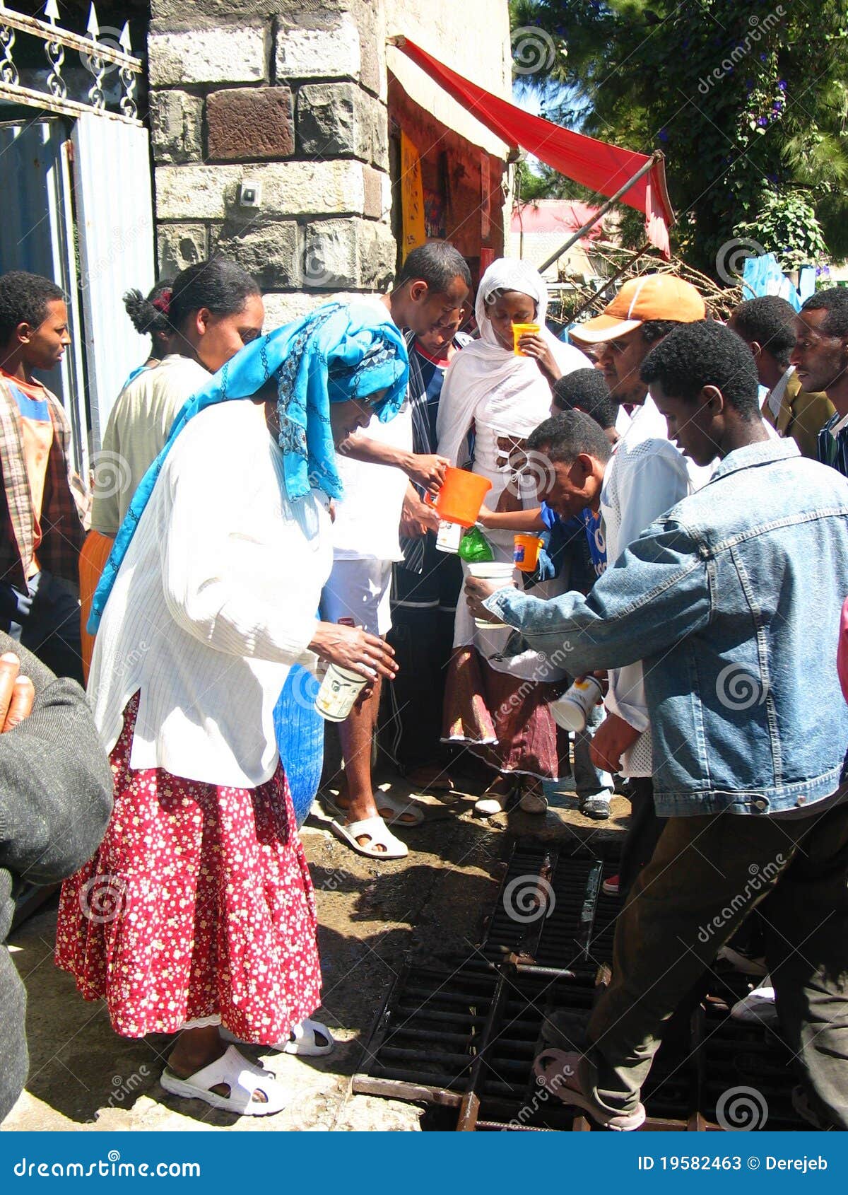 People Handing Out Water To a Thirsty Crowd Editorial Stock Photo ...