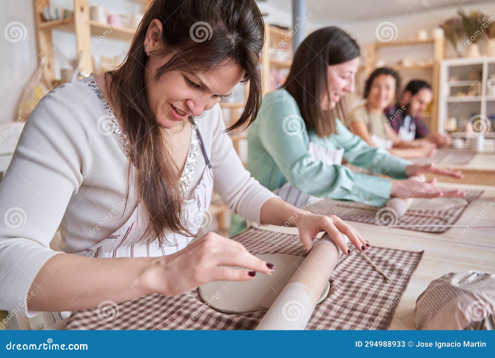 People Having Fun while Working with Ceramic in a Pottery Workshop ...