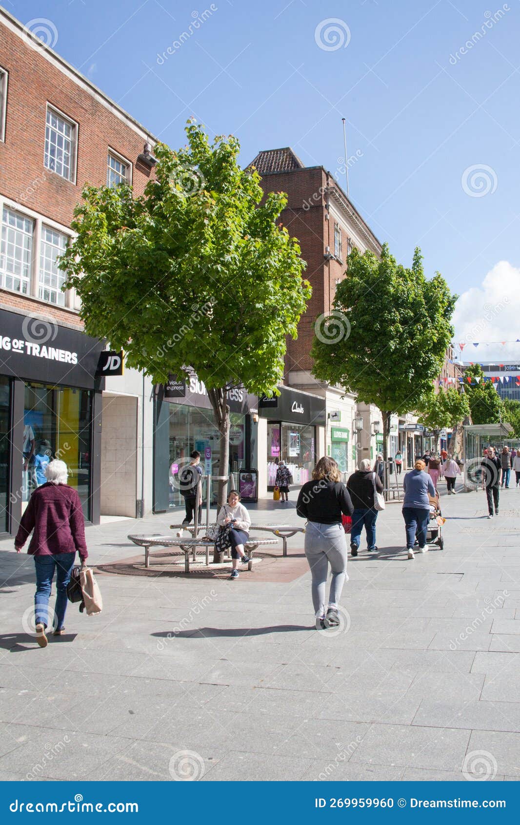 People on the High Street in Exeter, Devon in the UK Editorial Image ...