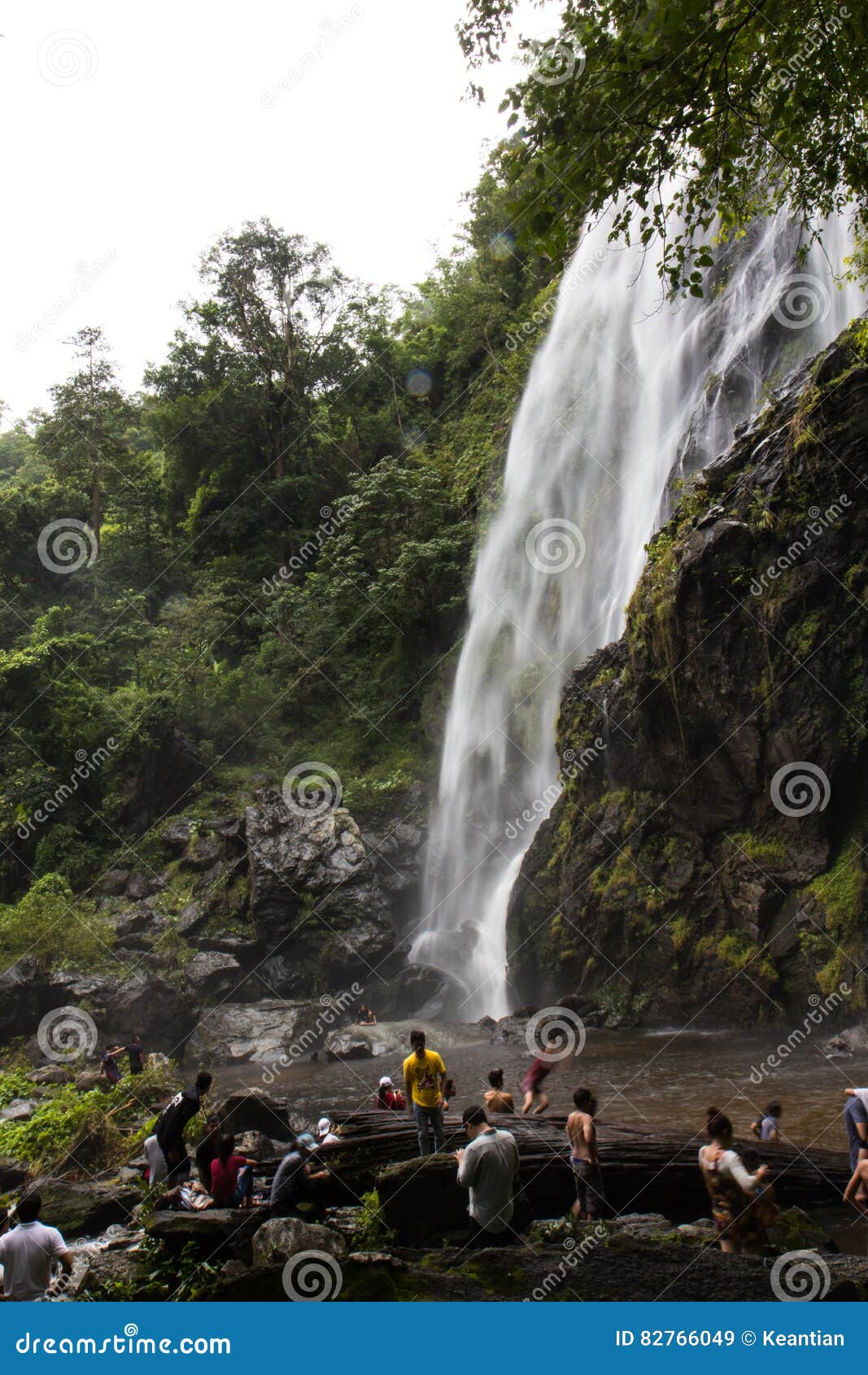 People with High Waterfall. Stock Image - Image of island, people: 82766049