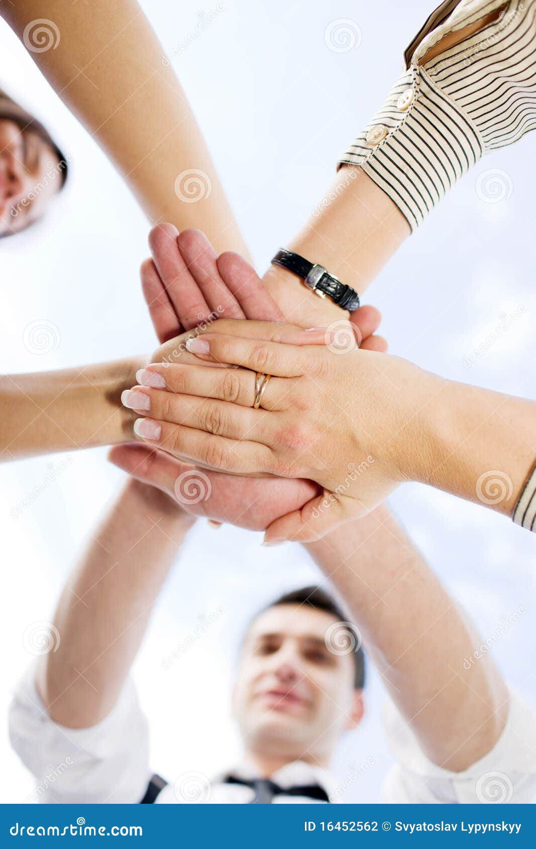 People hold hands together stock photo. Image of approval - 16452562