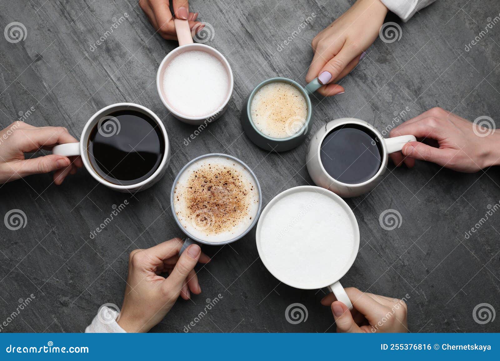 People Holding Different Cups with Aromatic Hot Coffee at Grey Table ...