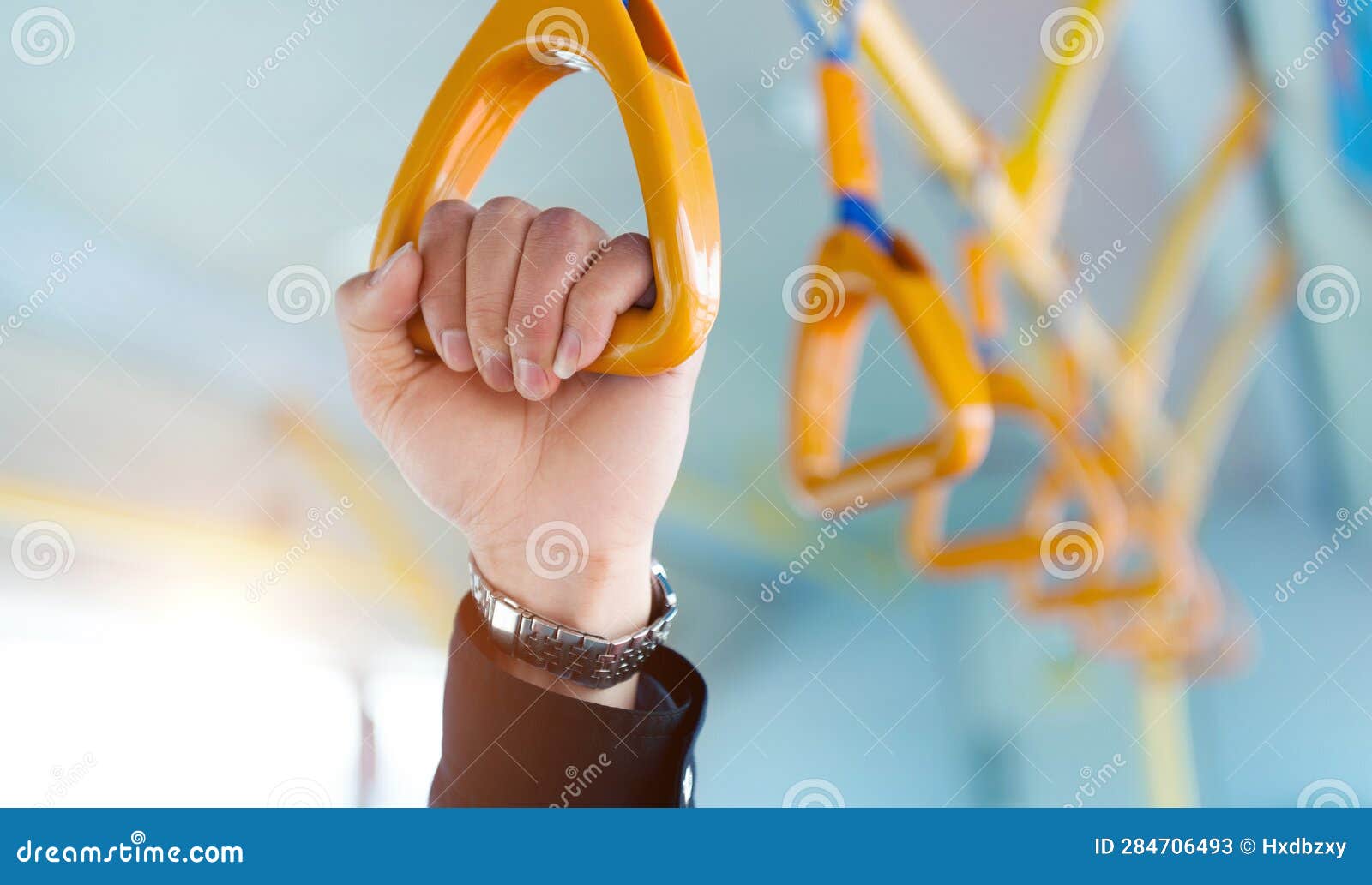People Holding Handle on Train Stock Image - Image of hold, handrail ...
