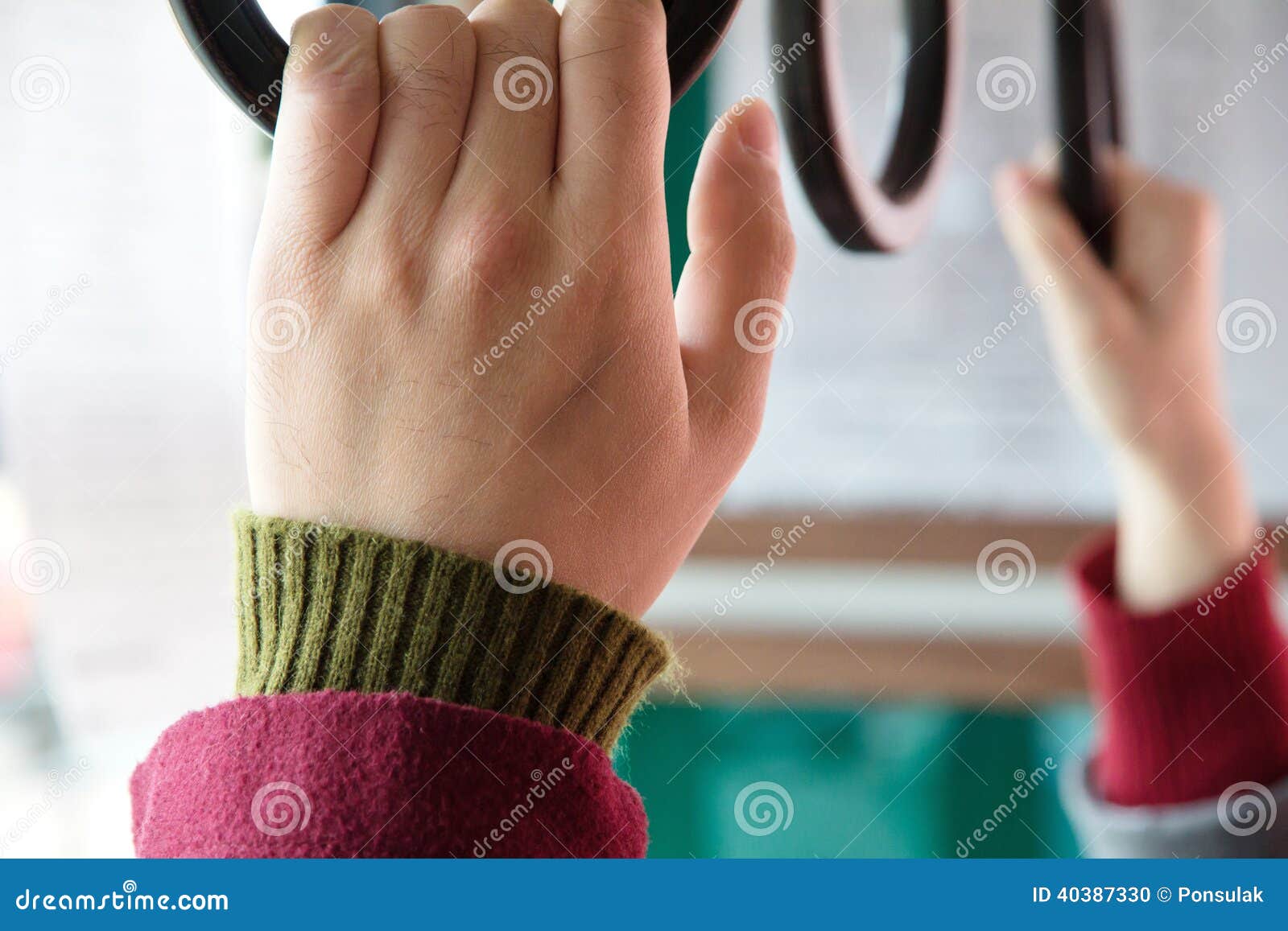 People Holding Onto a Handle Stock Photo - Image of male, handrail ...