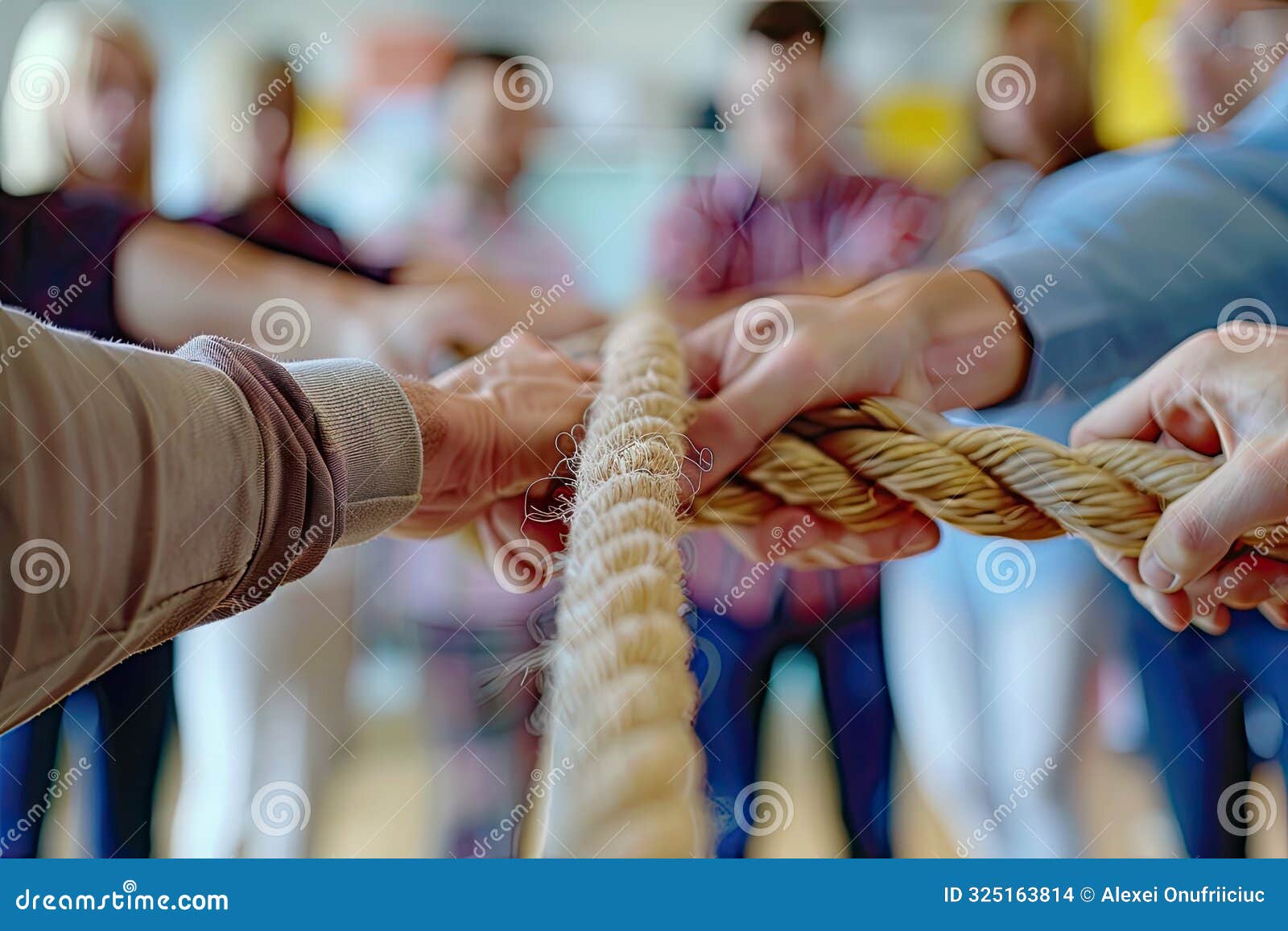 People Holding a Rope Together for a Common Purpose Stock Photo - Image ...