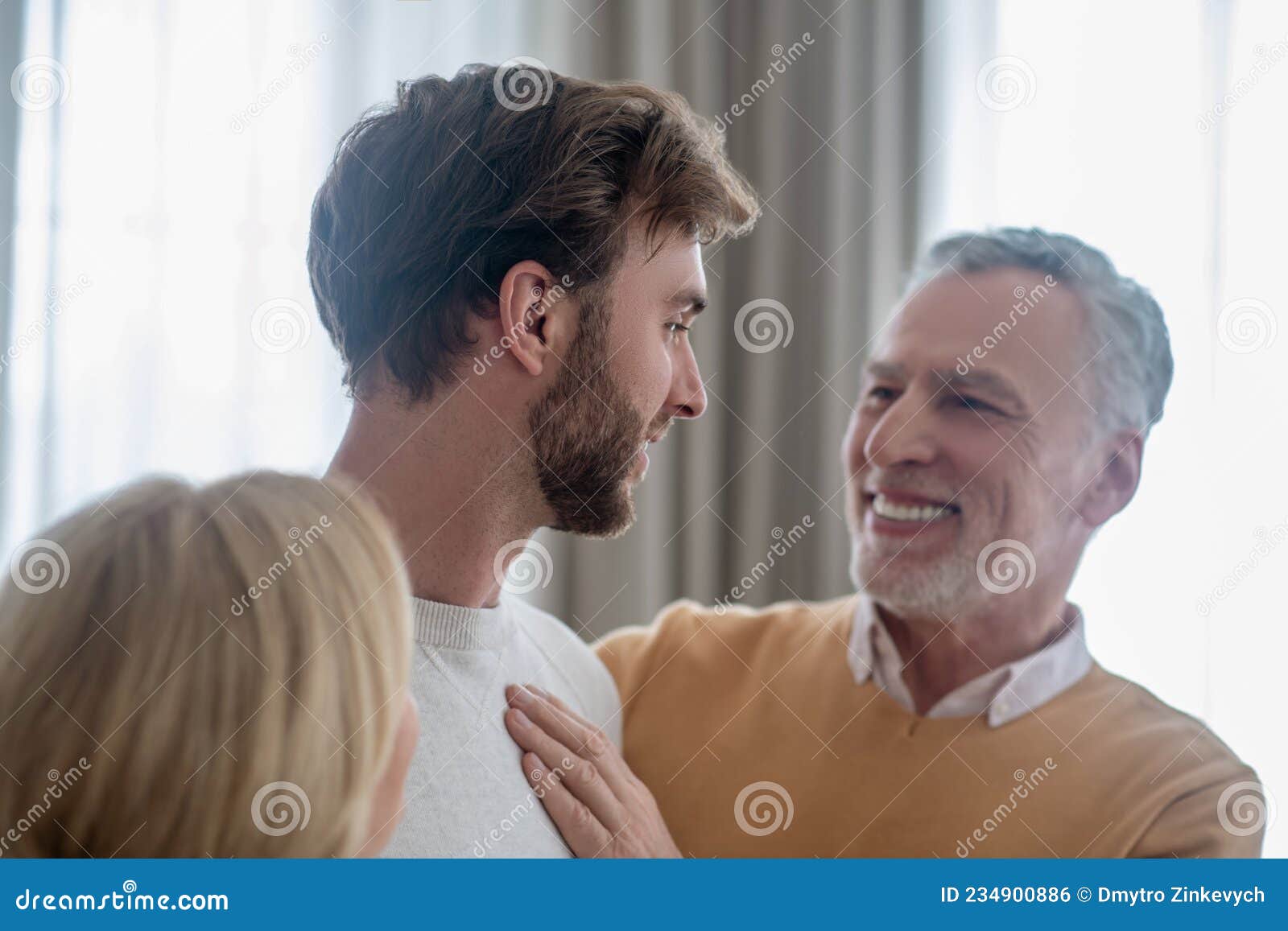 People Hugging and Holding Hands Having Met after a Long Separation ...