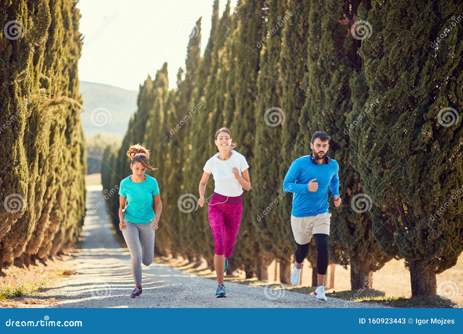 People Jogging Outdoors Training Together Stock Image - Image of ...