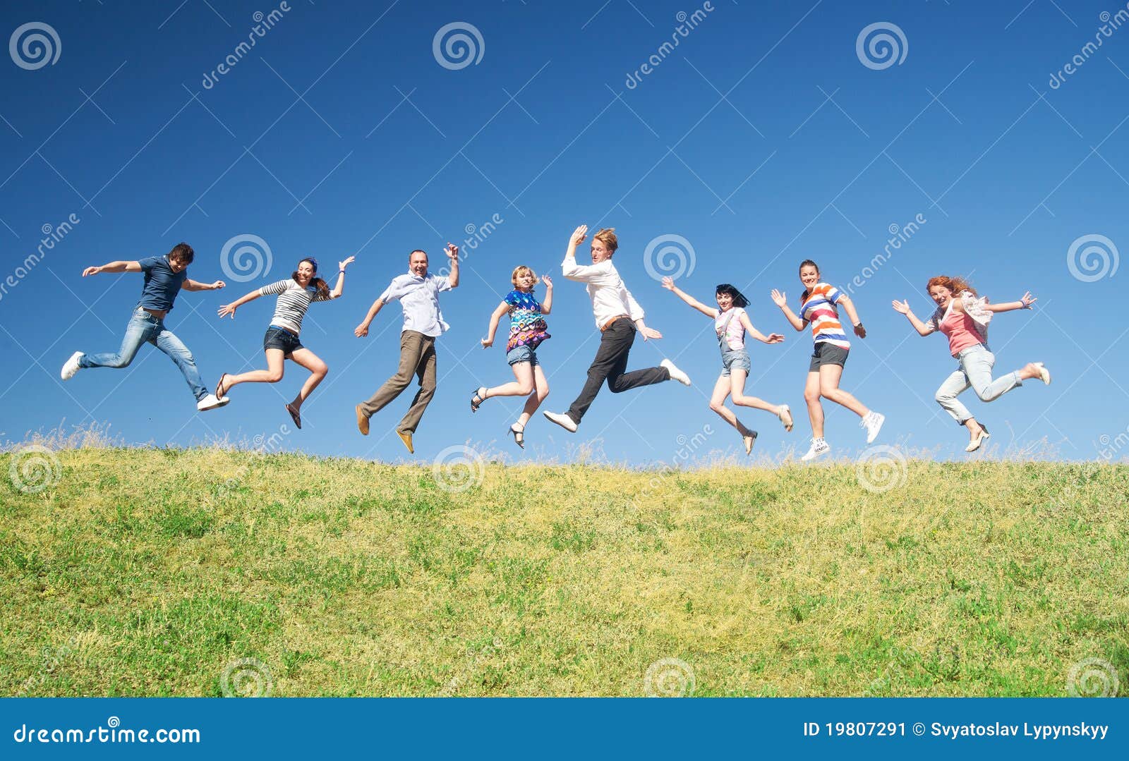 People Jump on Hill Across Sky Stock Image - Image of blue, cute: 19807291