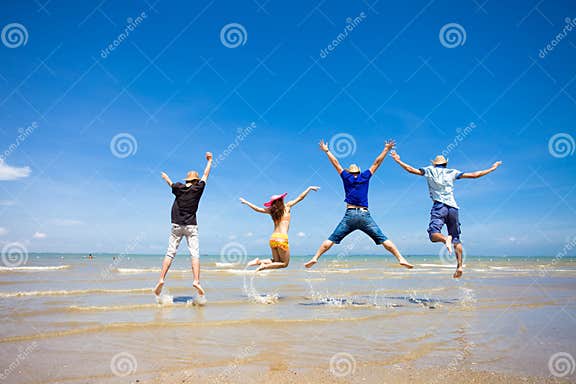 People Jumping at the Beach Stock Image - Image of jump, play: 20992767
