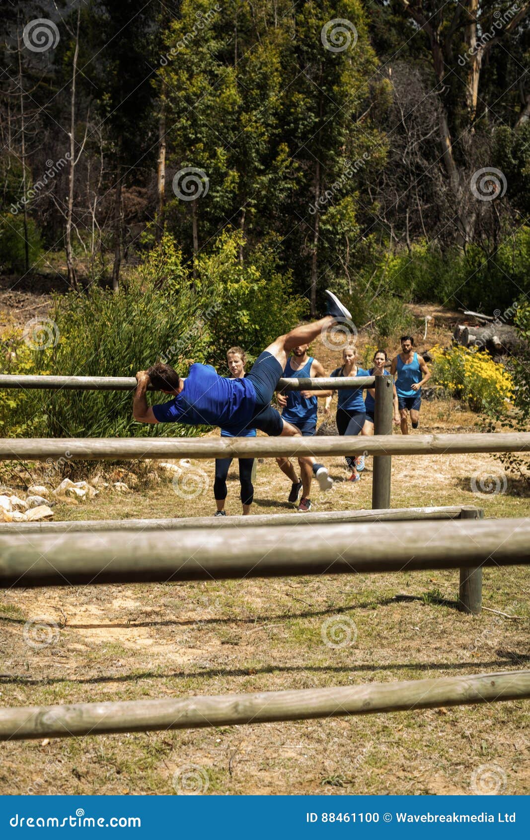 People Jumping Over the Hurdles during Obstacle Course Stock Photo ...