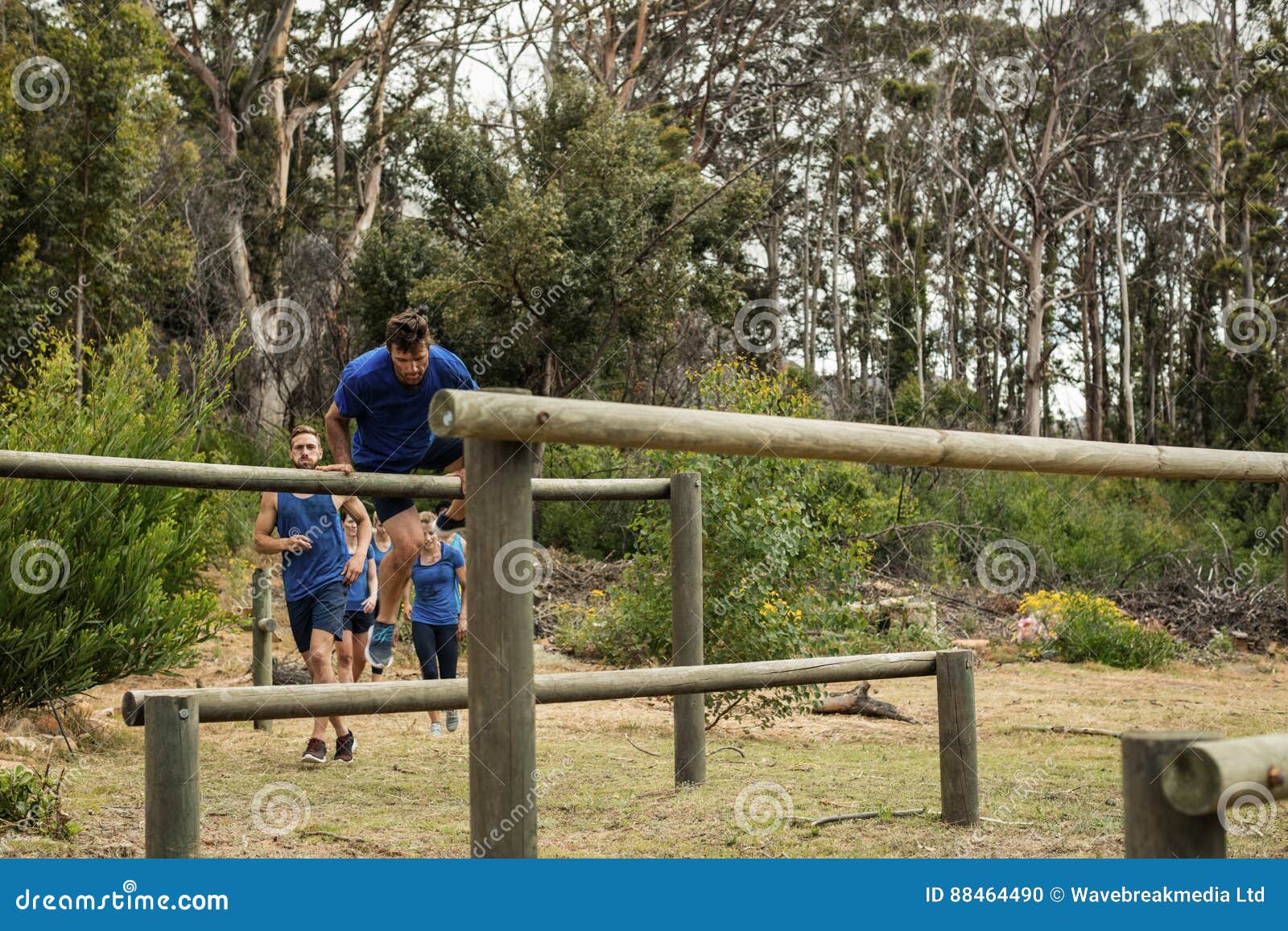 People Jumping Over the Hurdles during Obstacle Course Stock Photo ...