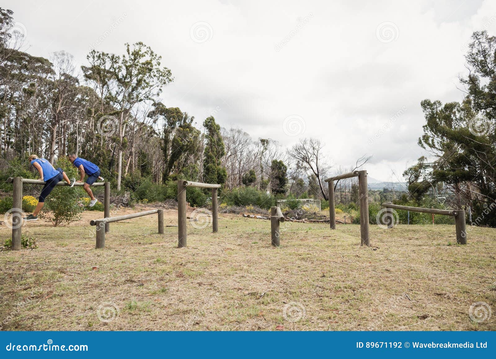 People Jumping Over the Hurdles during Obstacle Course Stock Photo ...