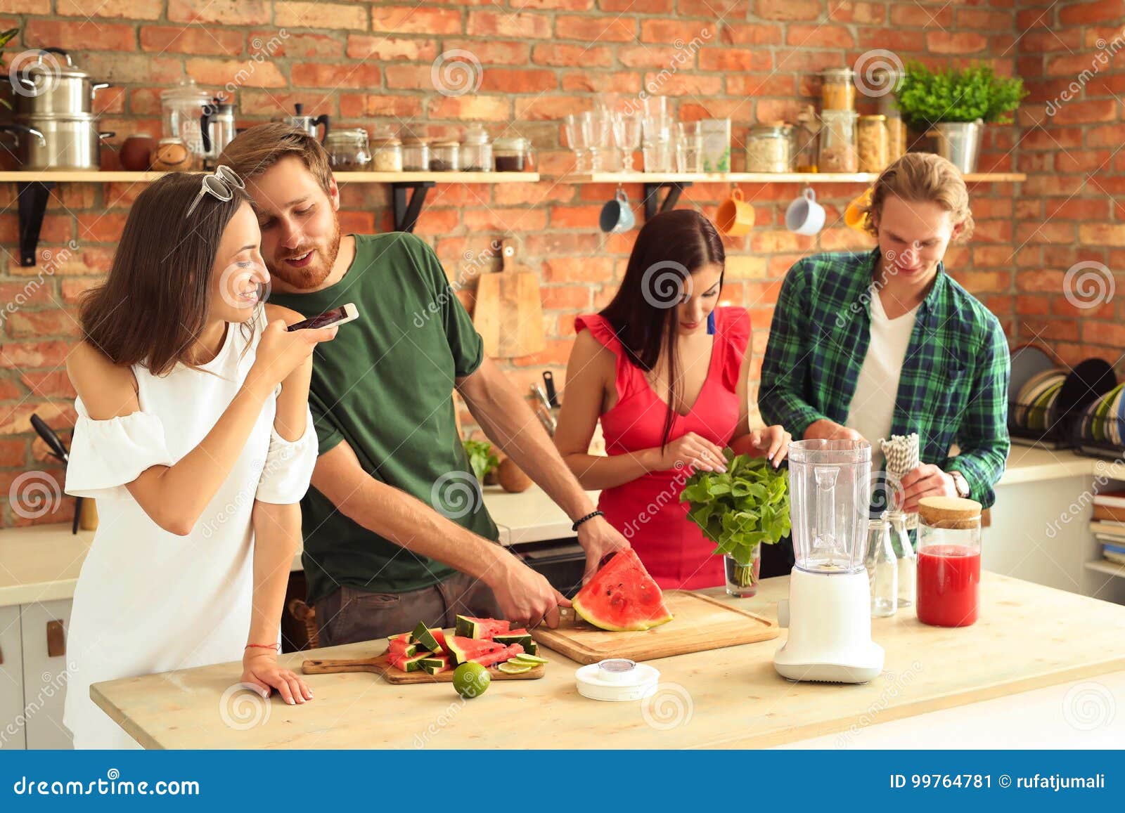 People at kitchen stock image. Image of lifestyle, meal - 99764781