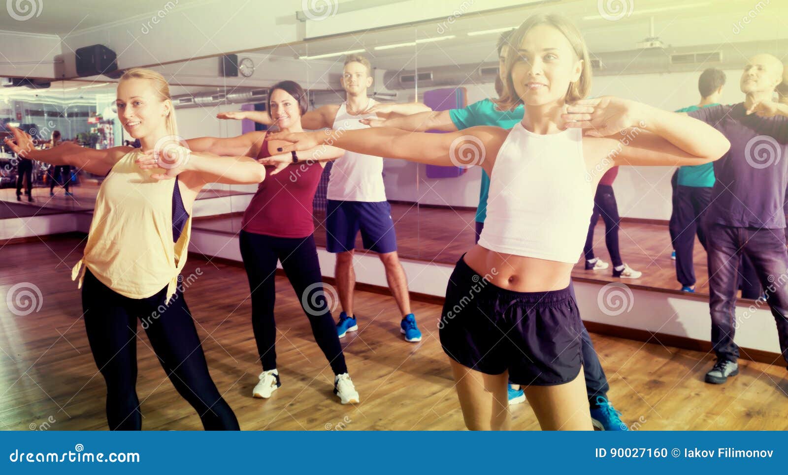 People Learning Zumba Elements Together in Dancing Class Stock Photo ...