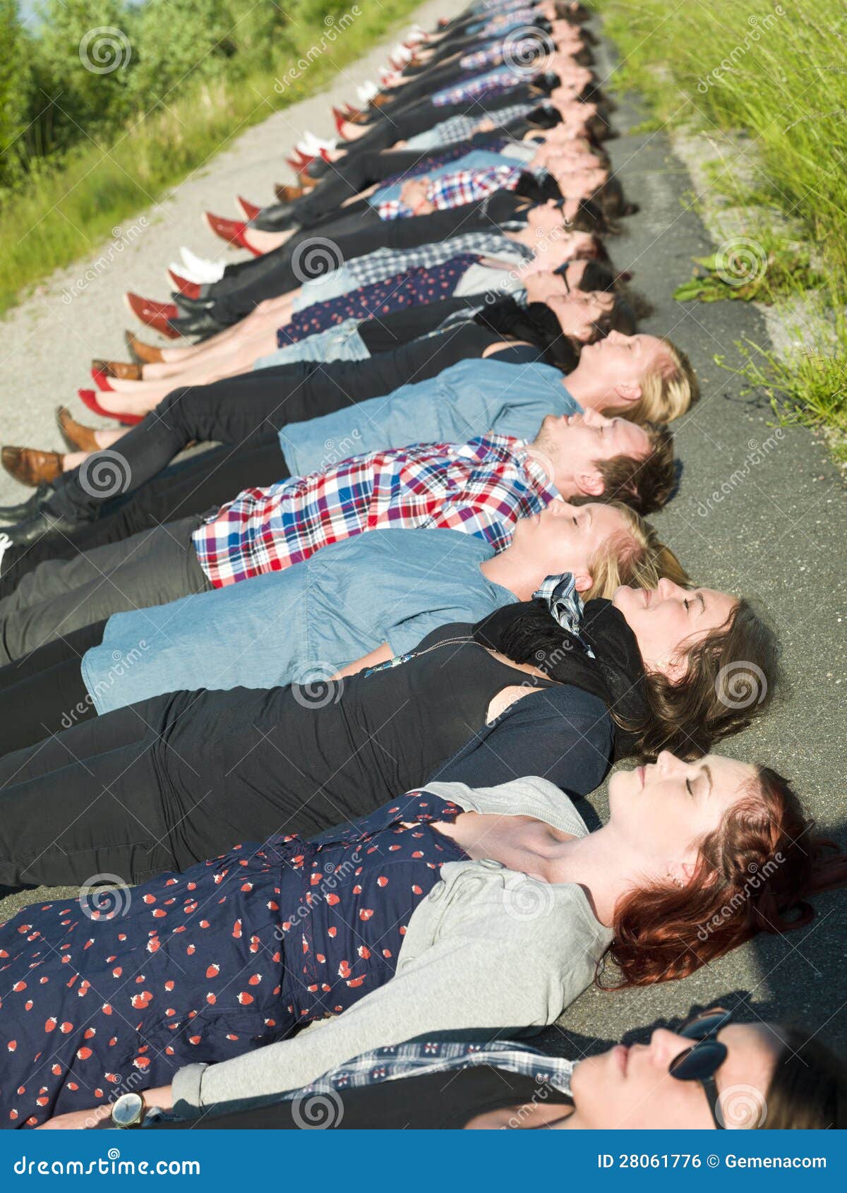 People Lieing on the Ground Stock Photo - Image of asphalt, casual ...