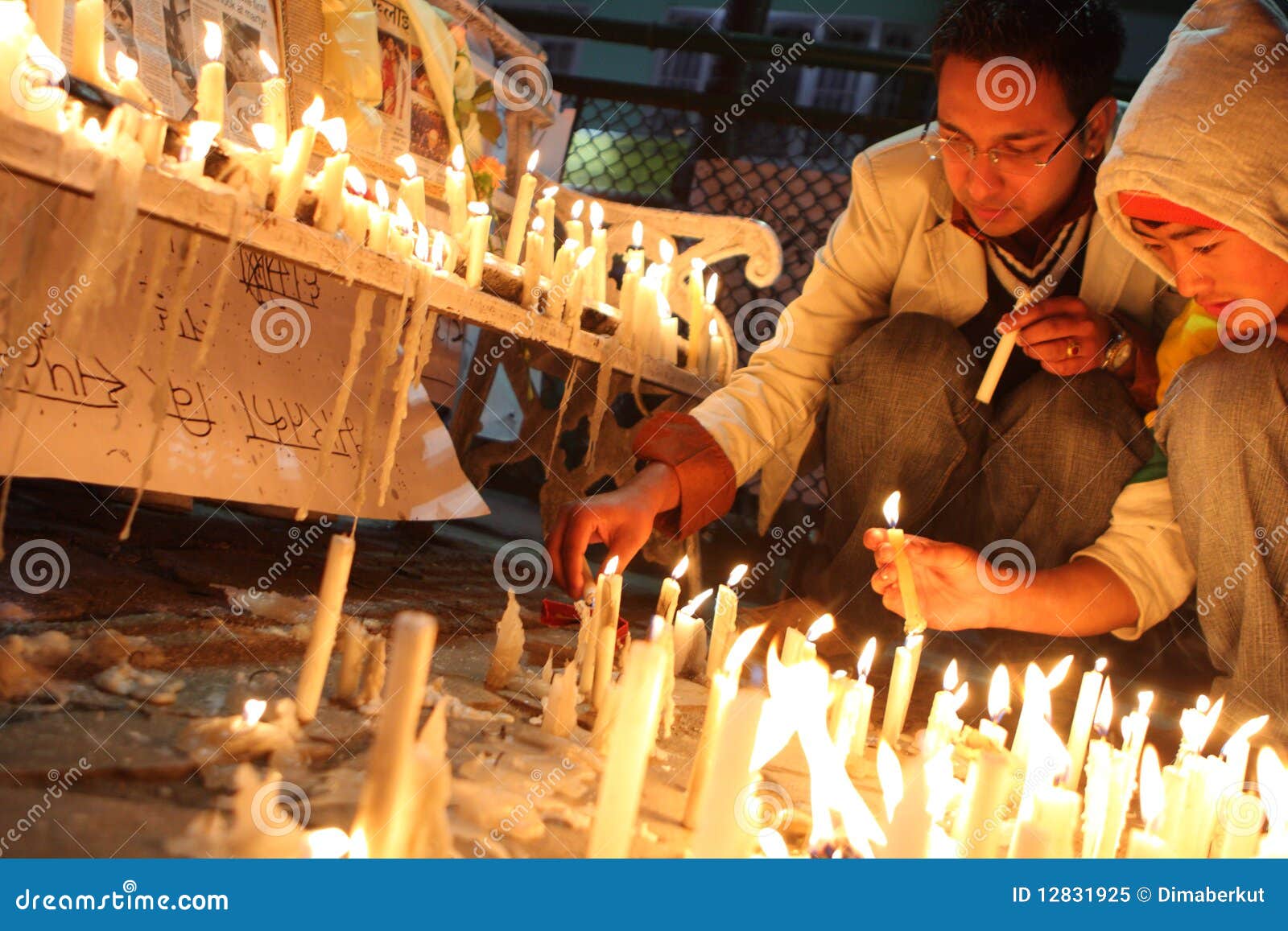 People light up candles editorial image. Image of crowd - 12831925