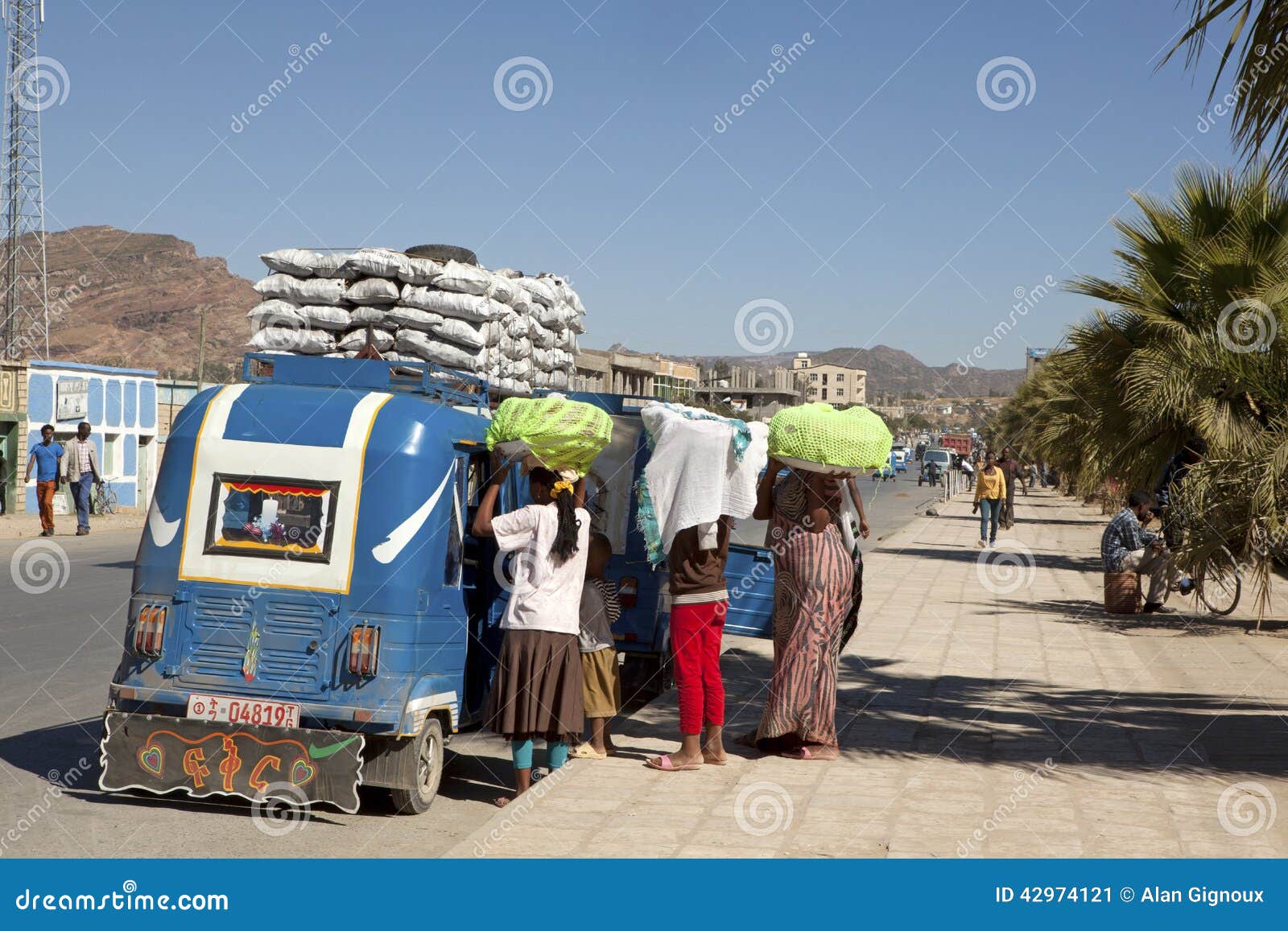 People Load The Trucks In Rain Editorial Photo | CartoonDealer.com ...