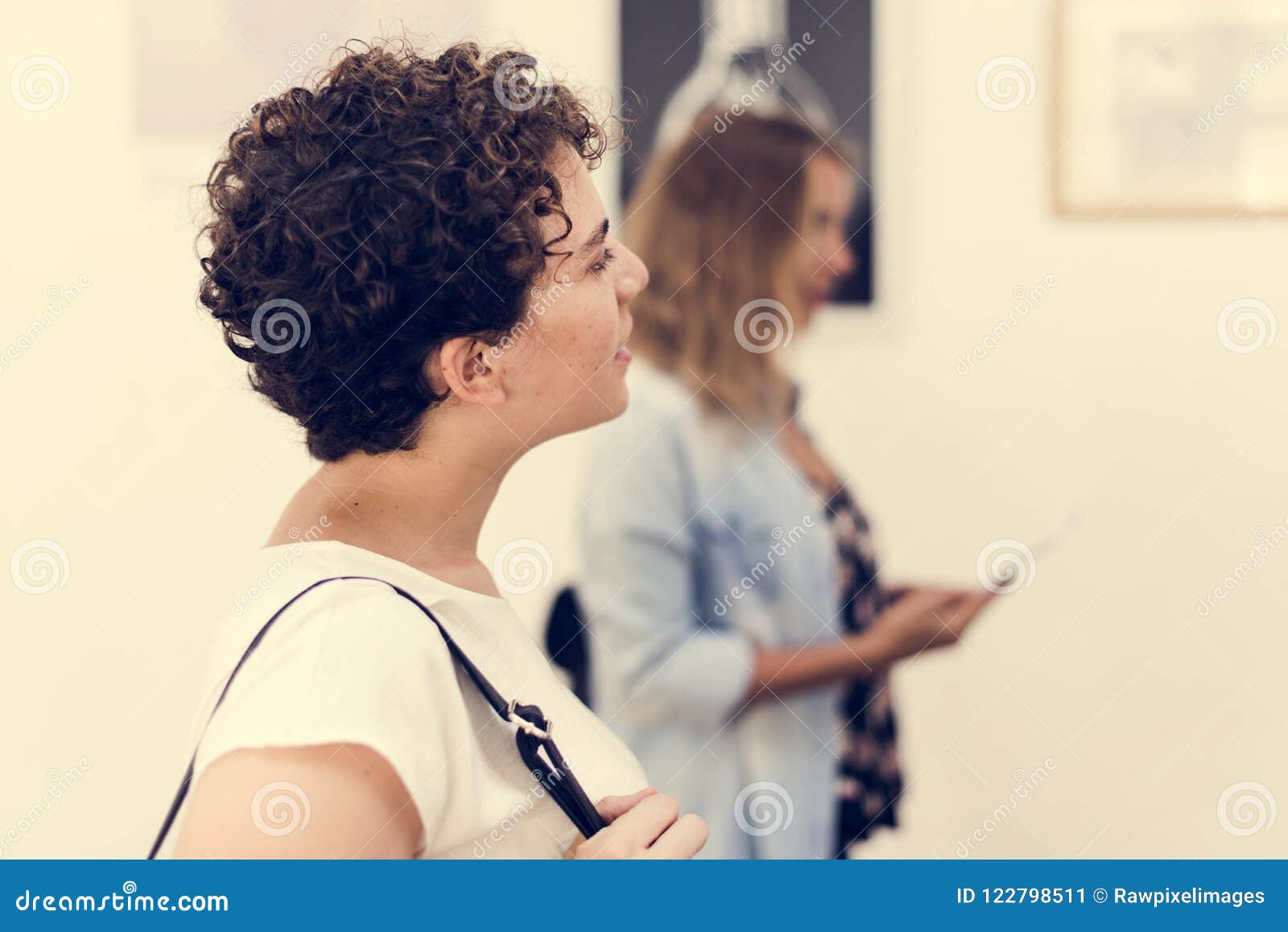 People Looking at Frames in an Exhibition Stock Image - Image of museum ...