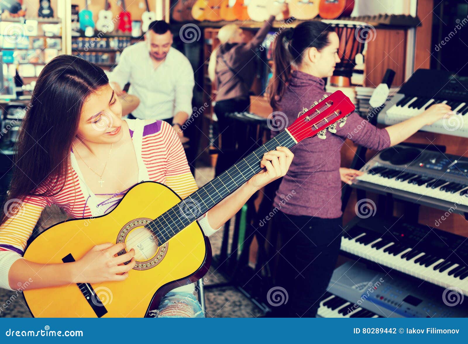 People Looking at Musical Instruments Stock Photo - Image of indoors ...
