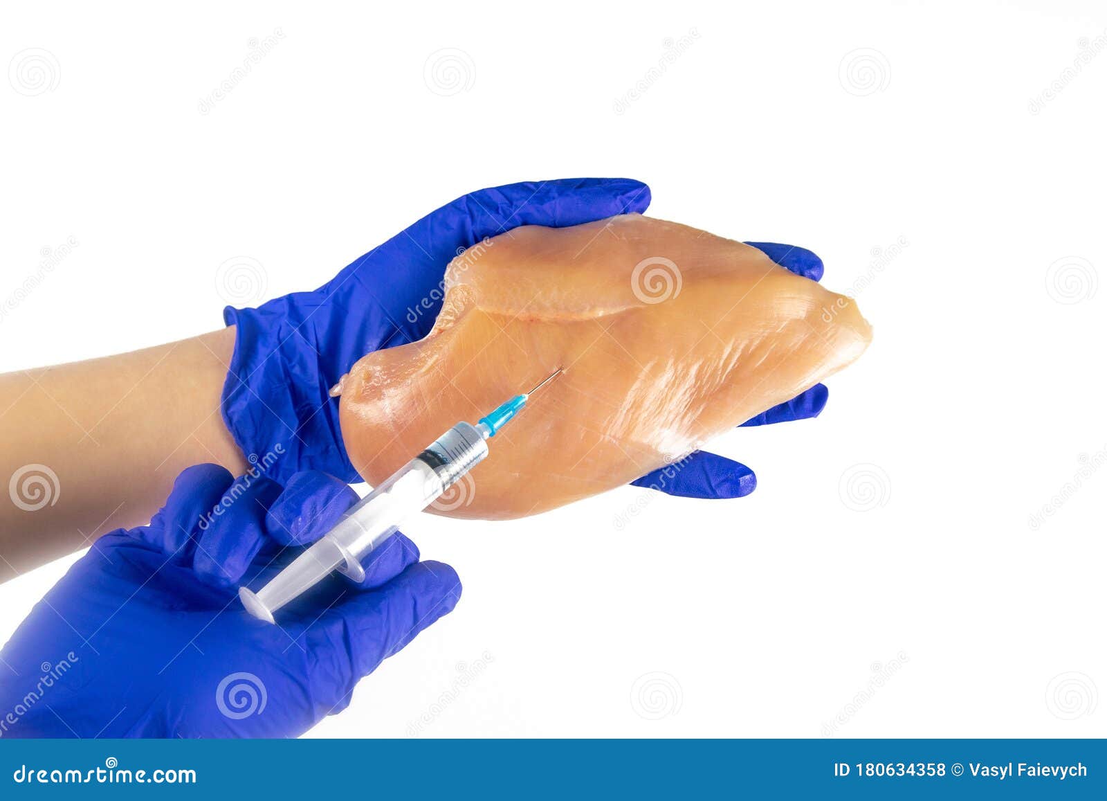 People Make Injection Syringe in Chicken Fillet on White Background ...