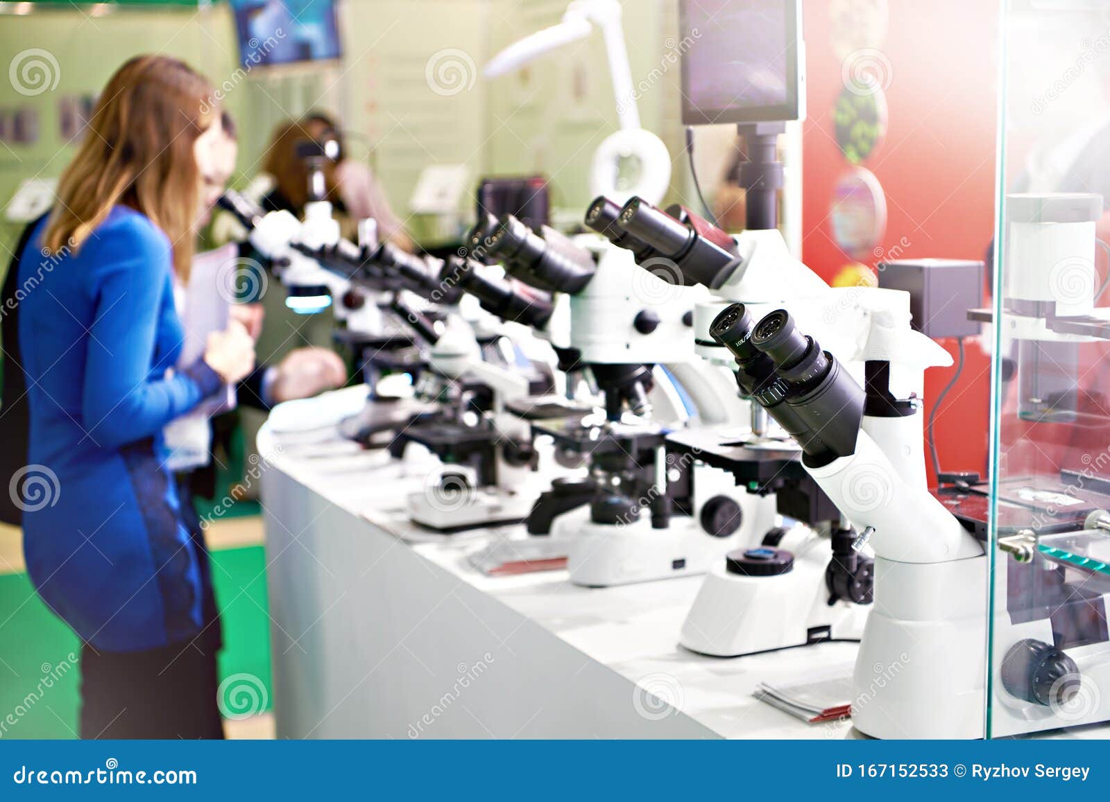 People and Microscopes in Store Stock Image - Image of buyer ...