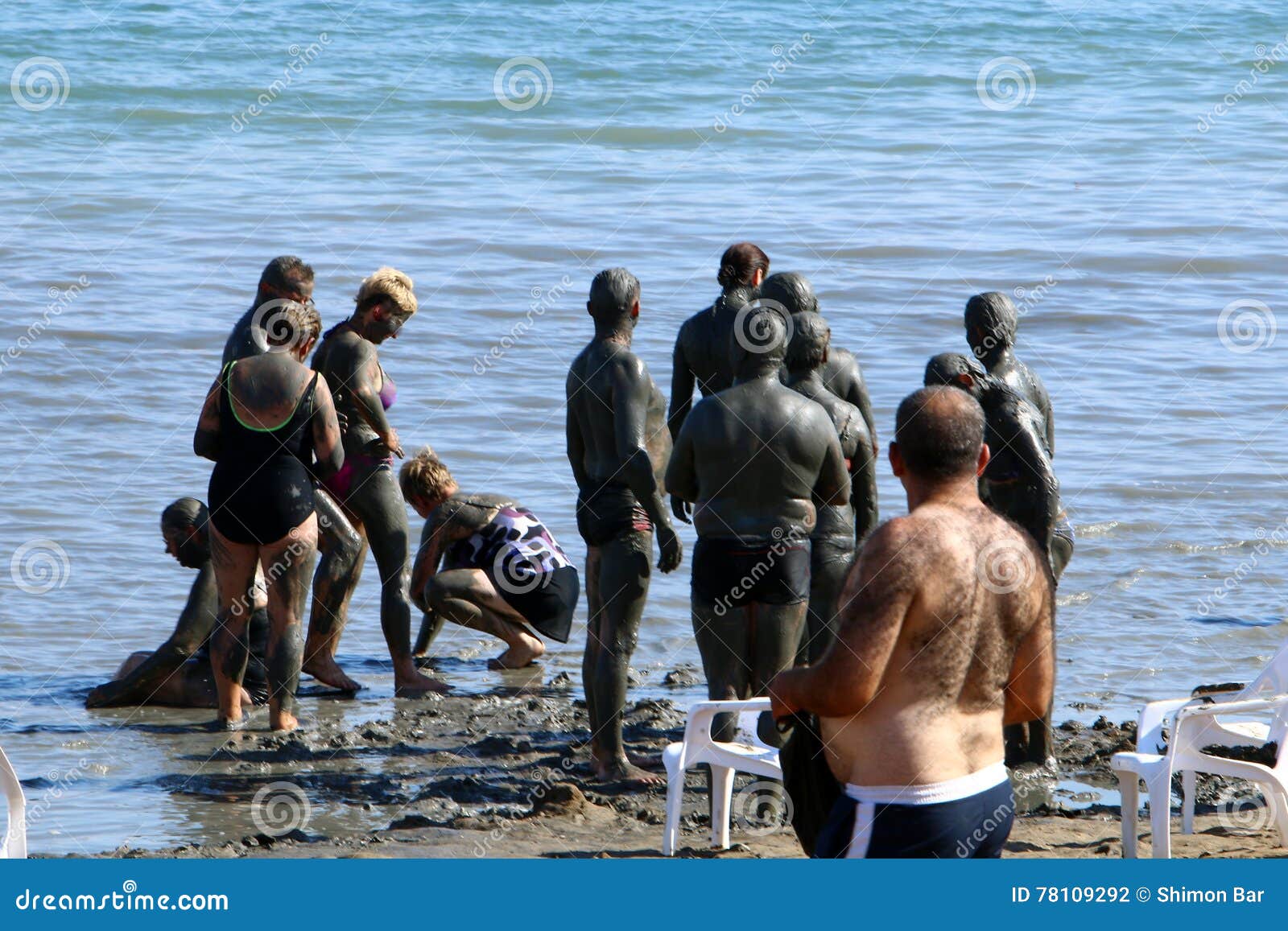 People in the mud editorial photography. Image of tourism - 78109292